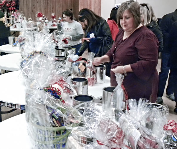 Benefit dinner turns spaghetti into school kids’ backpacks | News ...